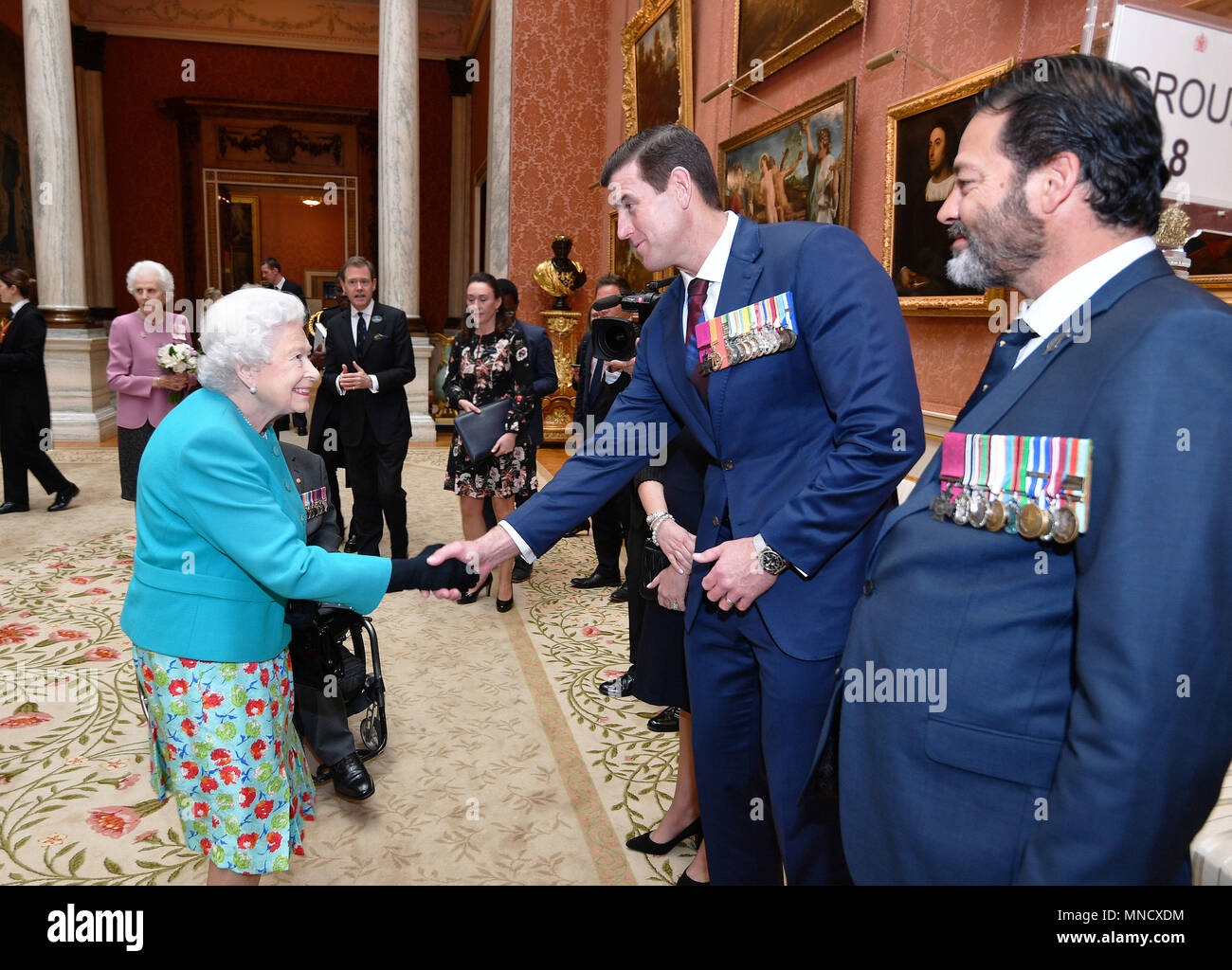 Queen Elizabeth II shakes hands with Mr Ben Roberts-Smith VC at a ... Queen Elizabeth II shakes hands with Mr Ben Roberts-Smith VC at a ...
