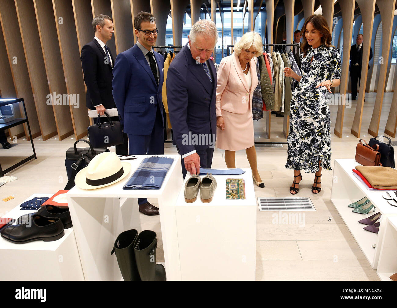 The Prince of Wales and the Duchess of Cornwall (both centre) tour the ...