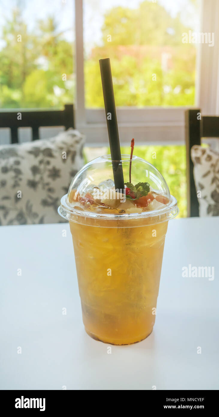 cocktail with fresh sliced fruits arranged in plastic cups Stock Photo ...