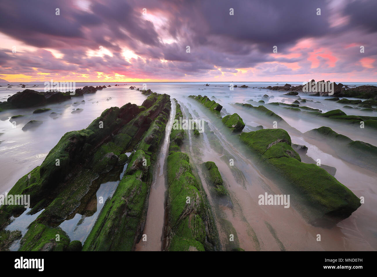 Amazing sunset over Barrika beach (Biscay, Basque Country), scenery of ...