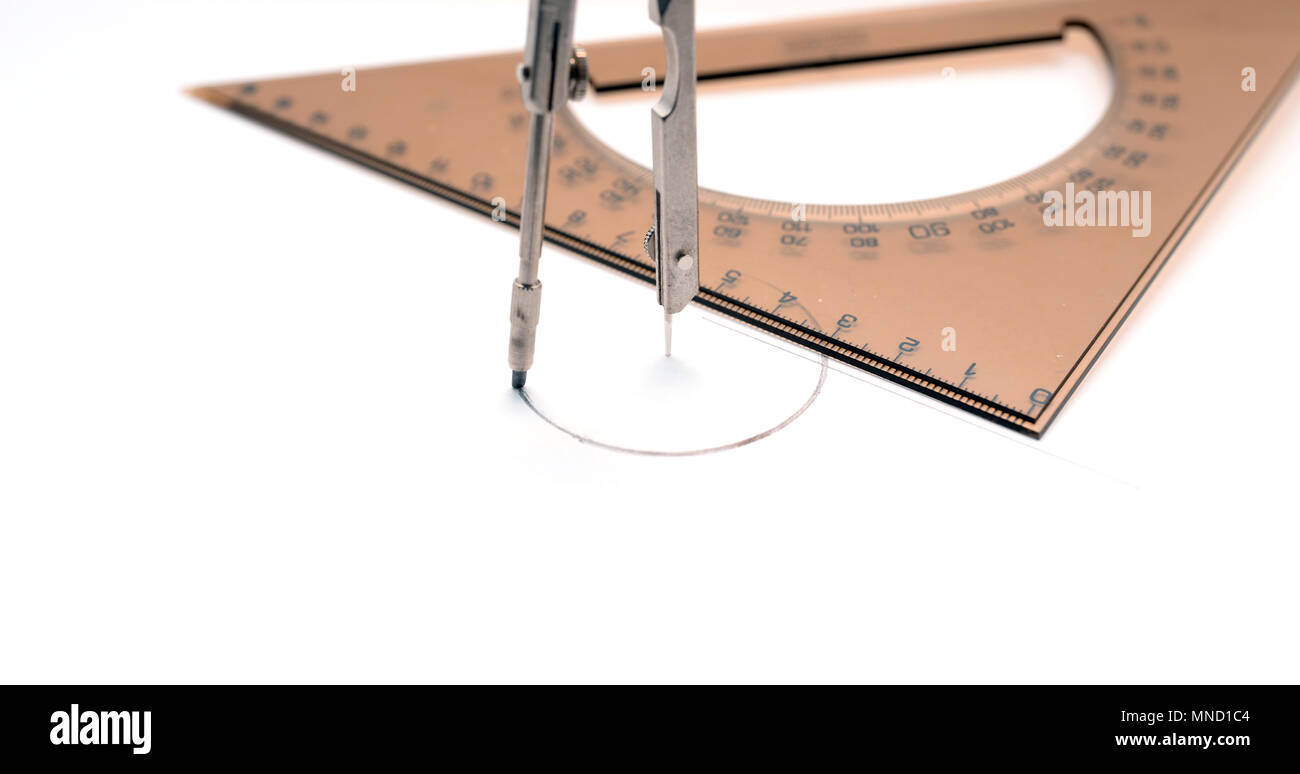 compass tool drawing a circle over white background Stock Photo - Alamy