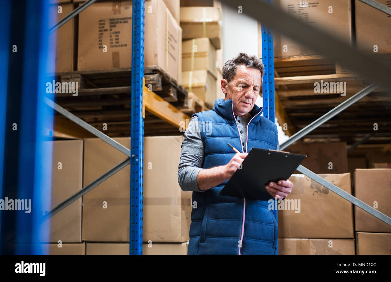 Senior male worker posing hi-res stock photography and images - Alamy