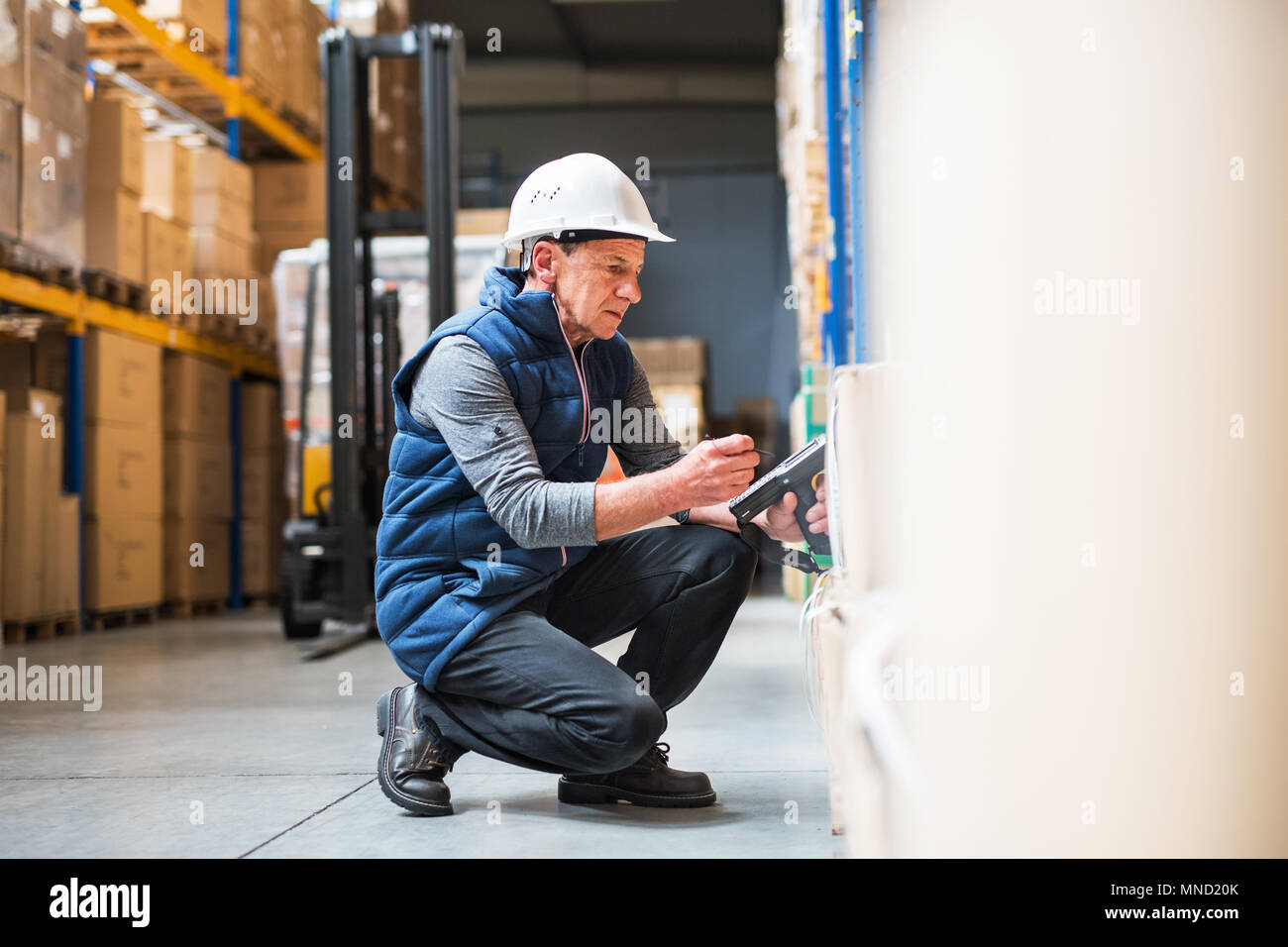 Portrait of a senior male warehouse worker or a supervisor Stock Photo ...