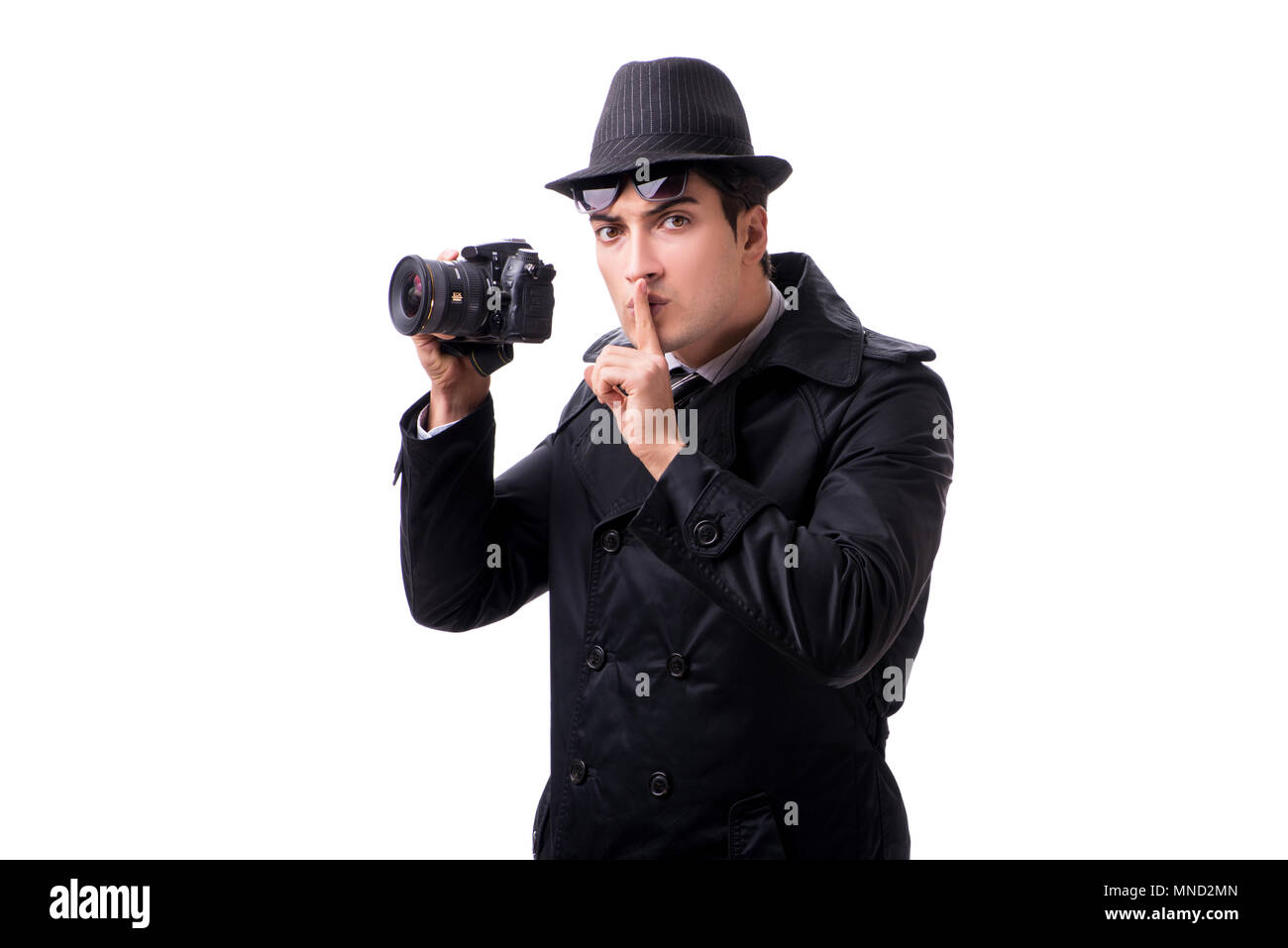 Spy with camera taking pictures isolated on white Stock Photo - Alamy