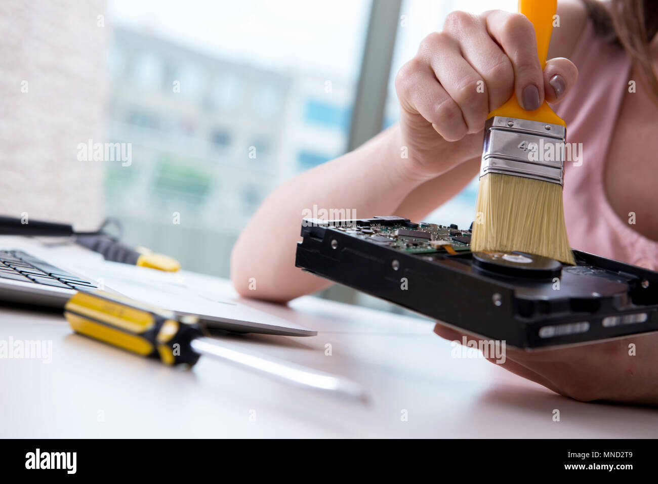 Hard drive repair and data recovery with restoration Stock Photo - Alamy