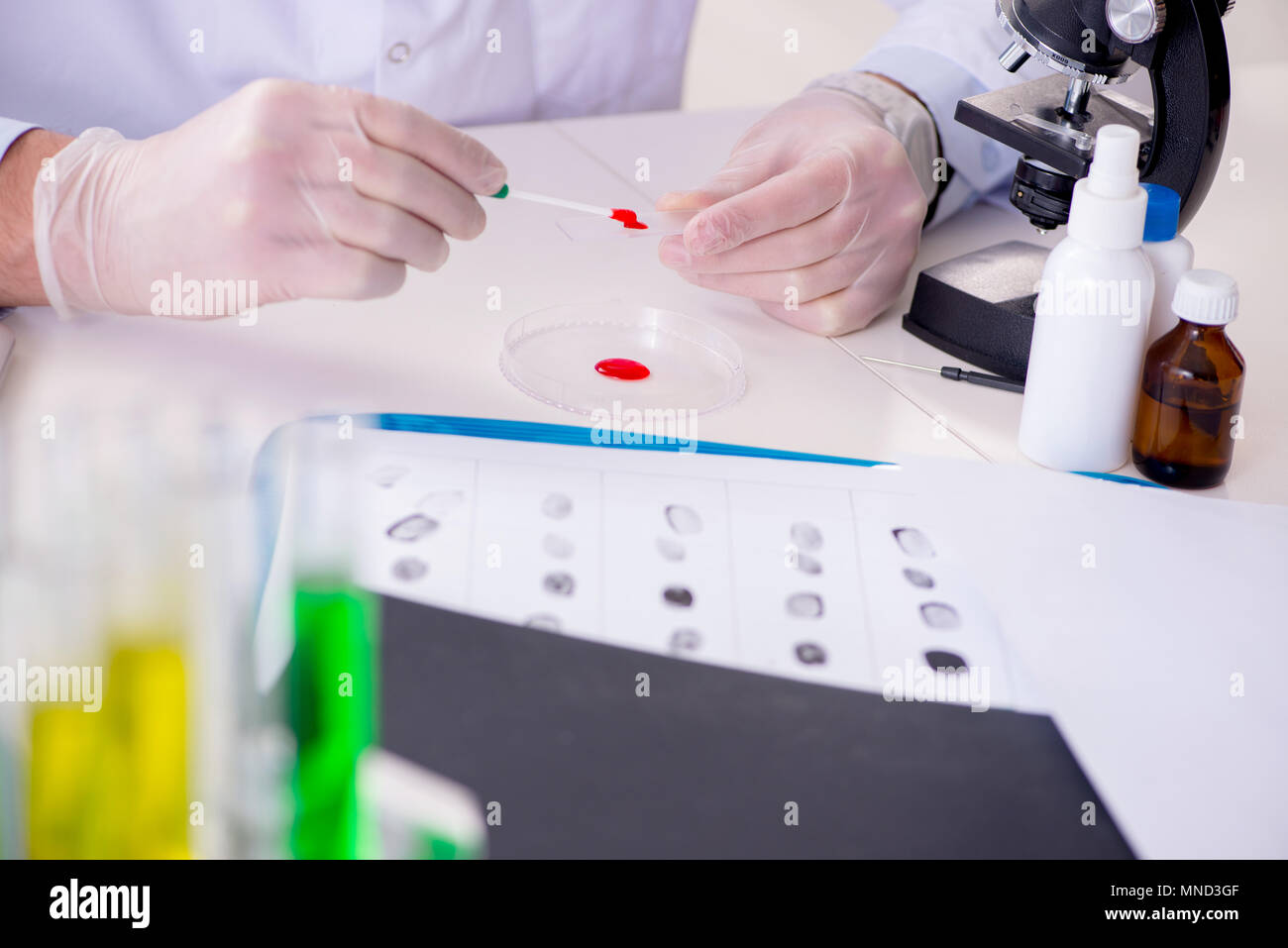 Drug synthesis lab experimentnig with pills Stock Photo - Alamy