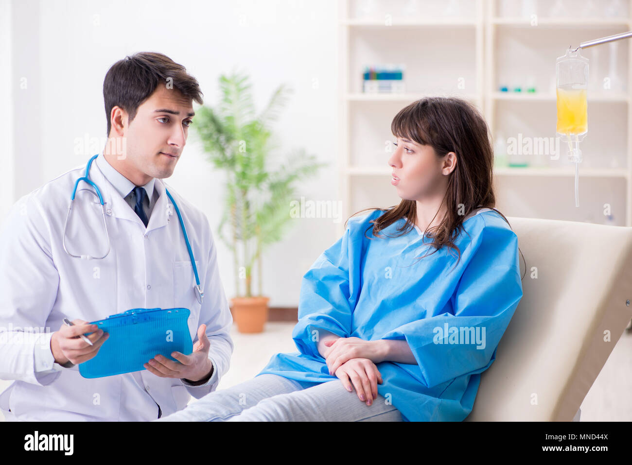 Doctor discussing blood transfusion with patient Stock Photo - Alamy