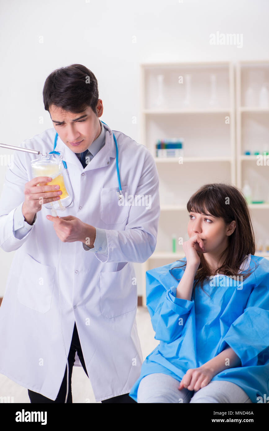 Doctor discussing blood transfusion with patient Stock Photo - Alamy