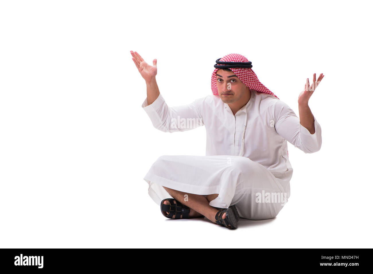 Saudi arab man sitting Cut Out Stock Images & Pictures - Alamy