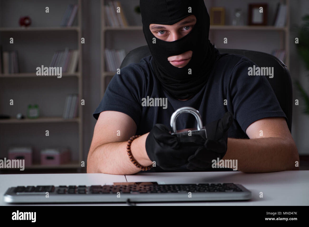 Hacker hacking computer late at night Stock Photo - Alamy