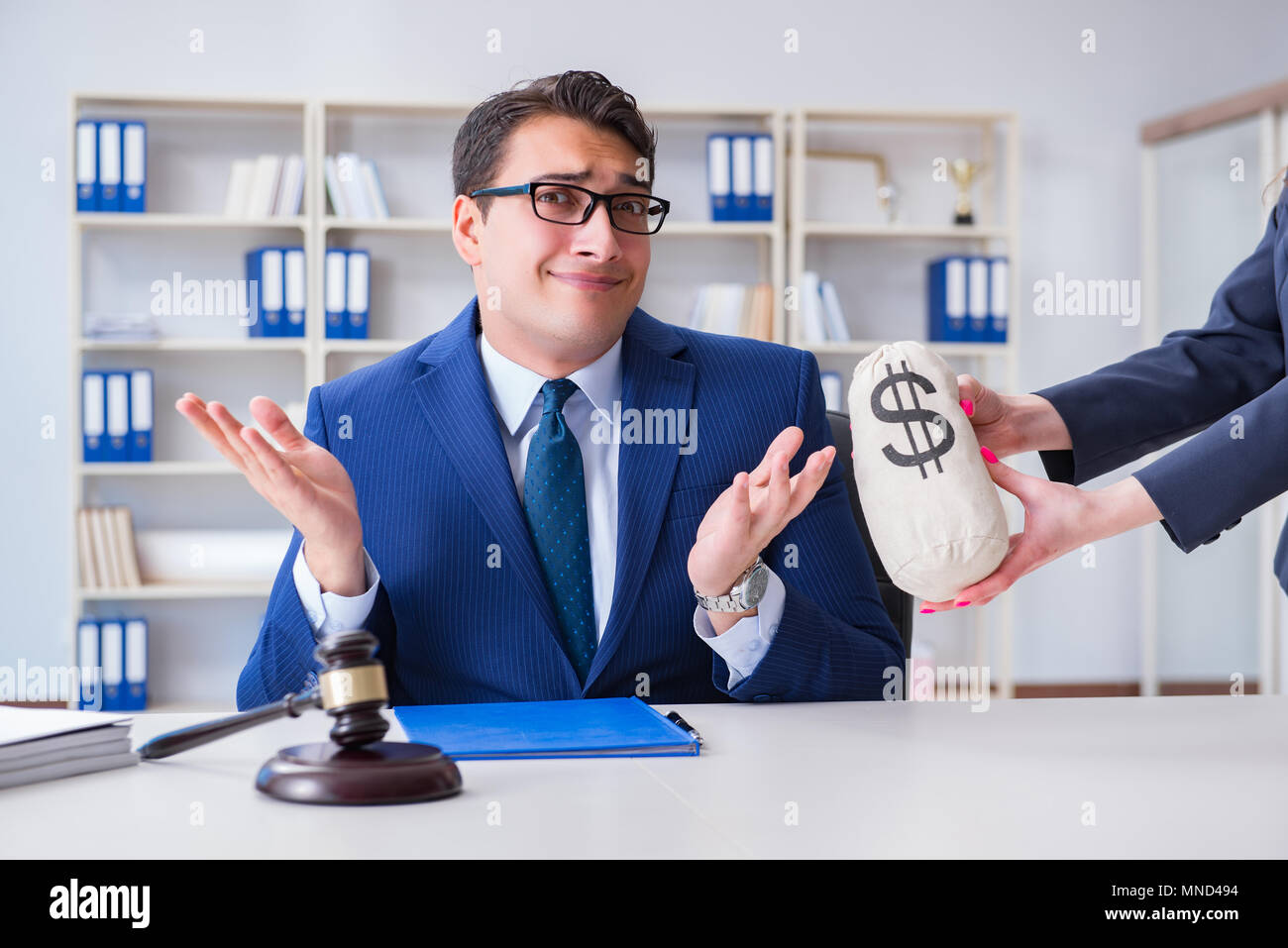 Judge in bribe concept with money Stock Photo - Alamy