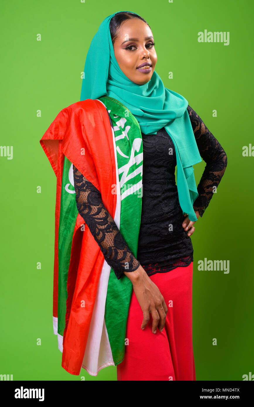 Young African Muslim woman against chroma key with green background ...