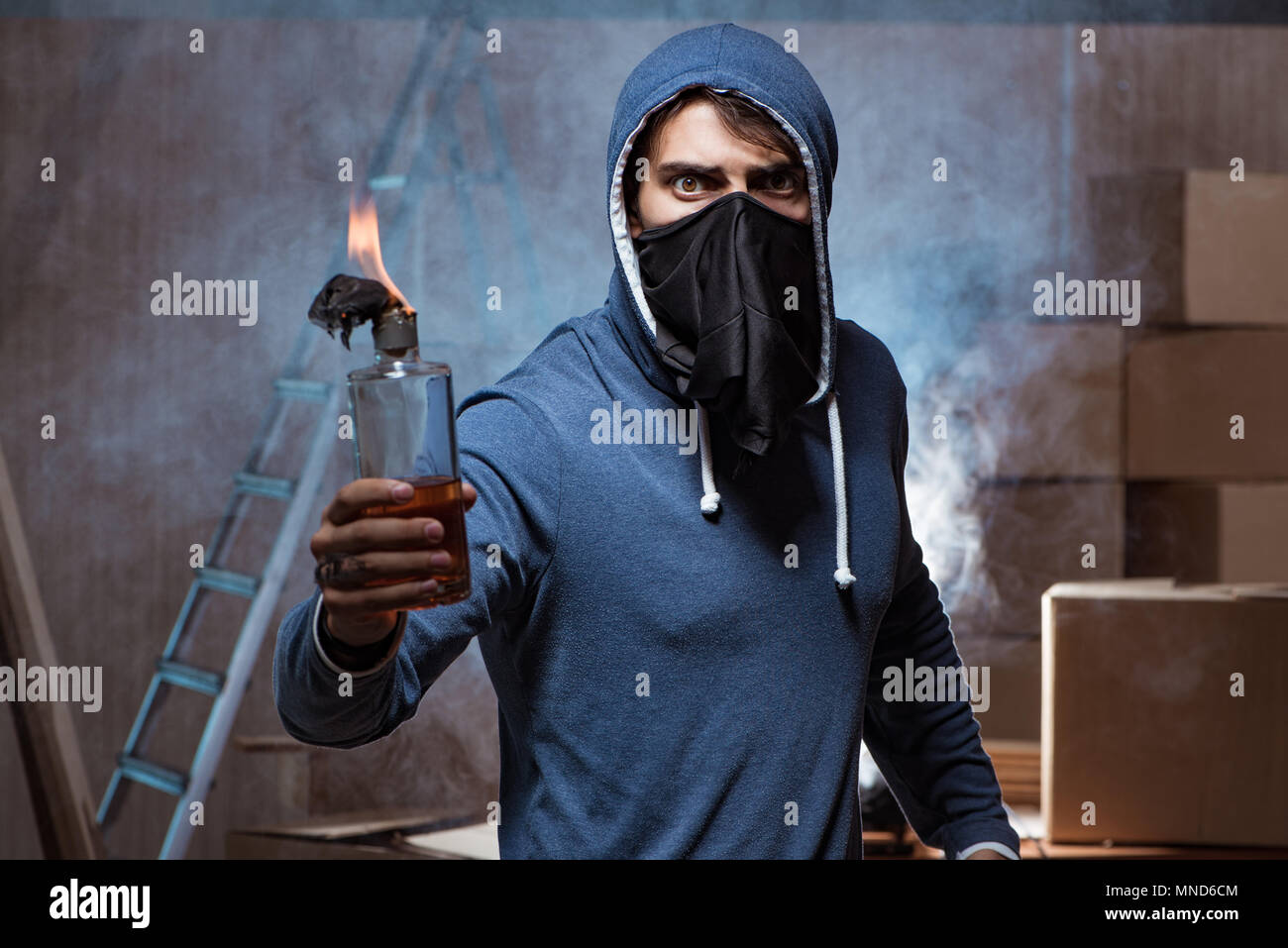 Throwing molotov cocktail hi-res stock photography and images - Alamy