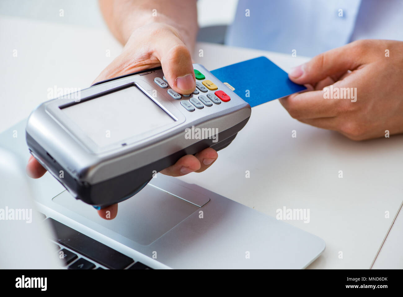 Man processing credit card transaction with POS terminal Stock Photo ...