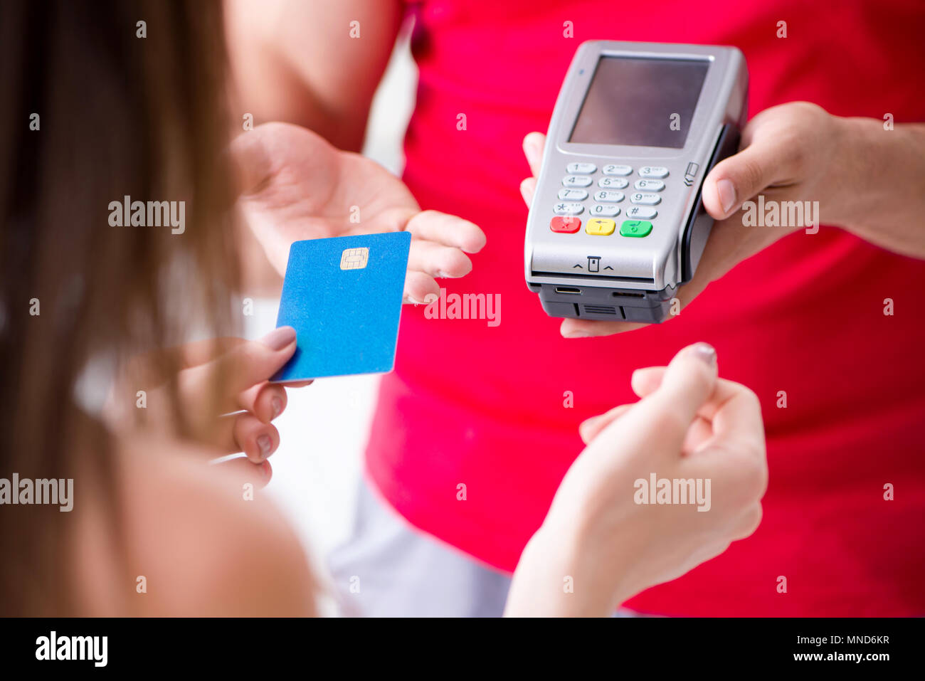Concept of paying with POS terminal Stock Photo - Alamy