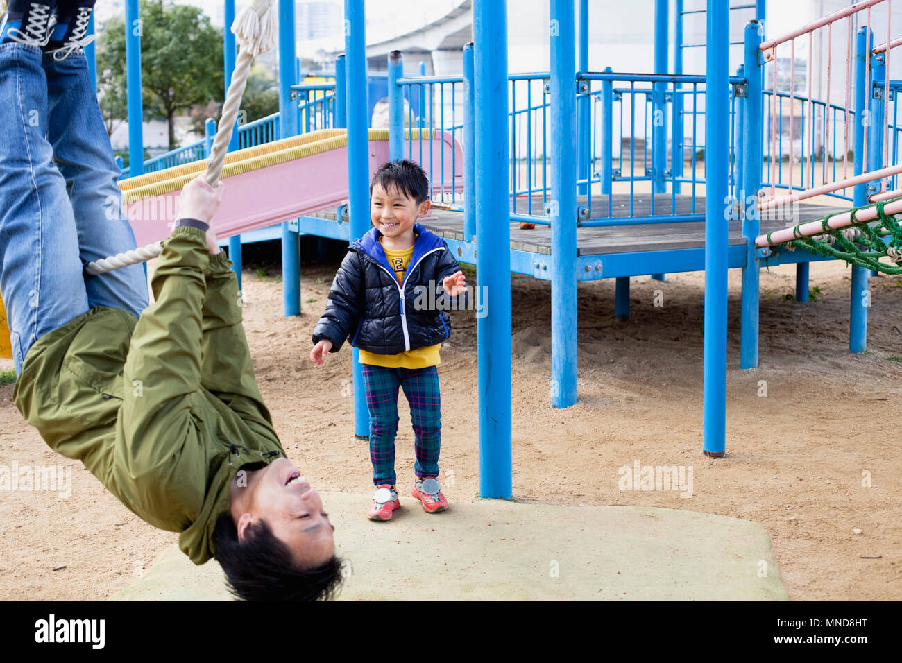 Swinging on rope hi-res stock photography and images - Alamy