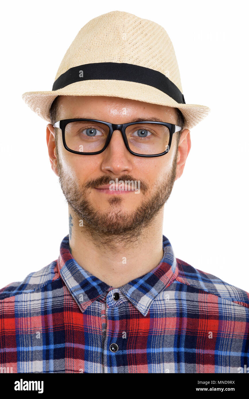 Face of young man wearing hat and eyeglasses Stock Photo - Alamy