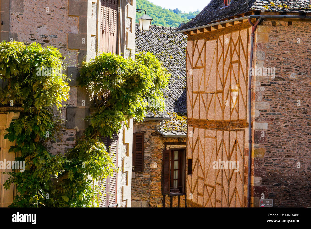 Streets in beautiful and picturesque medieval town Conques, Occitanie ...