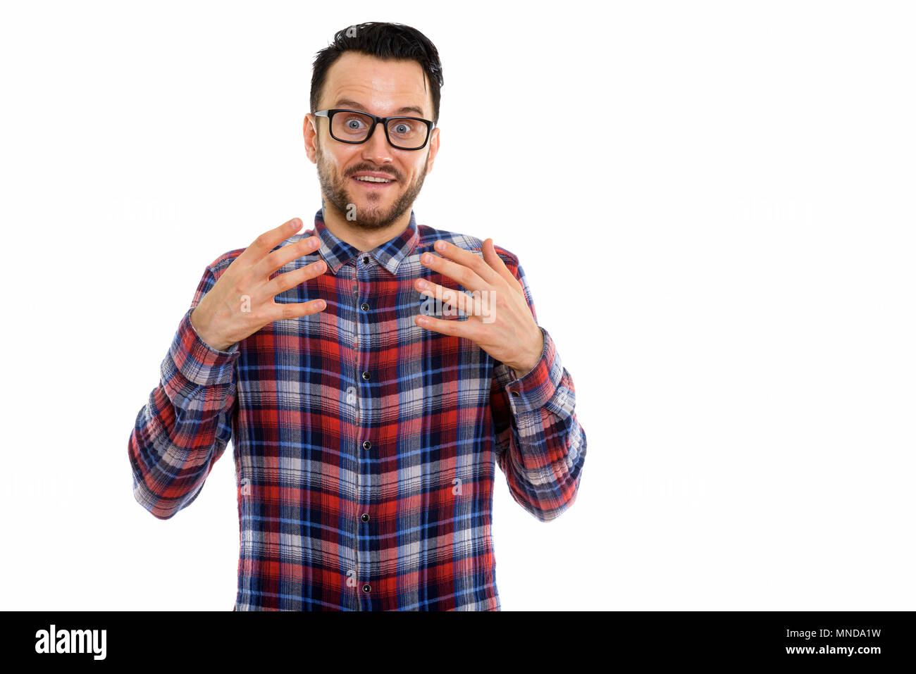 Surprised young man smiling hi-res stock photography and images - Alamy