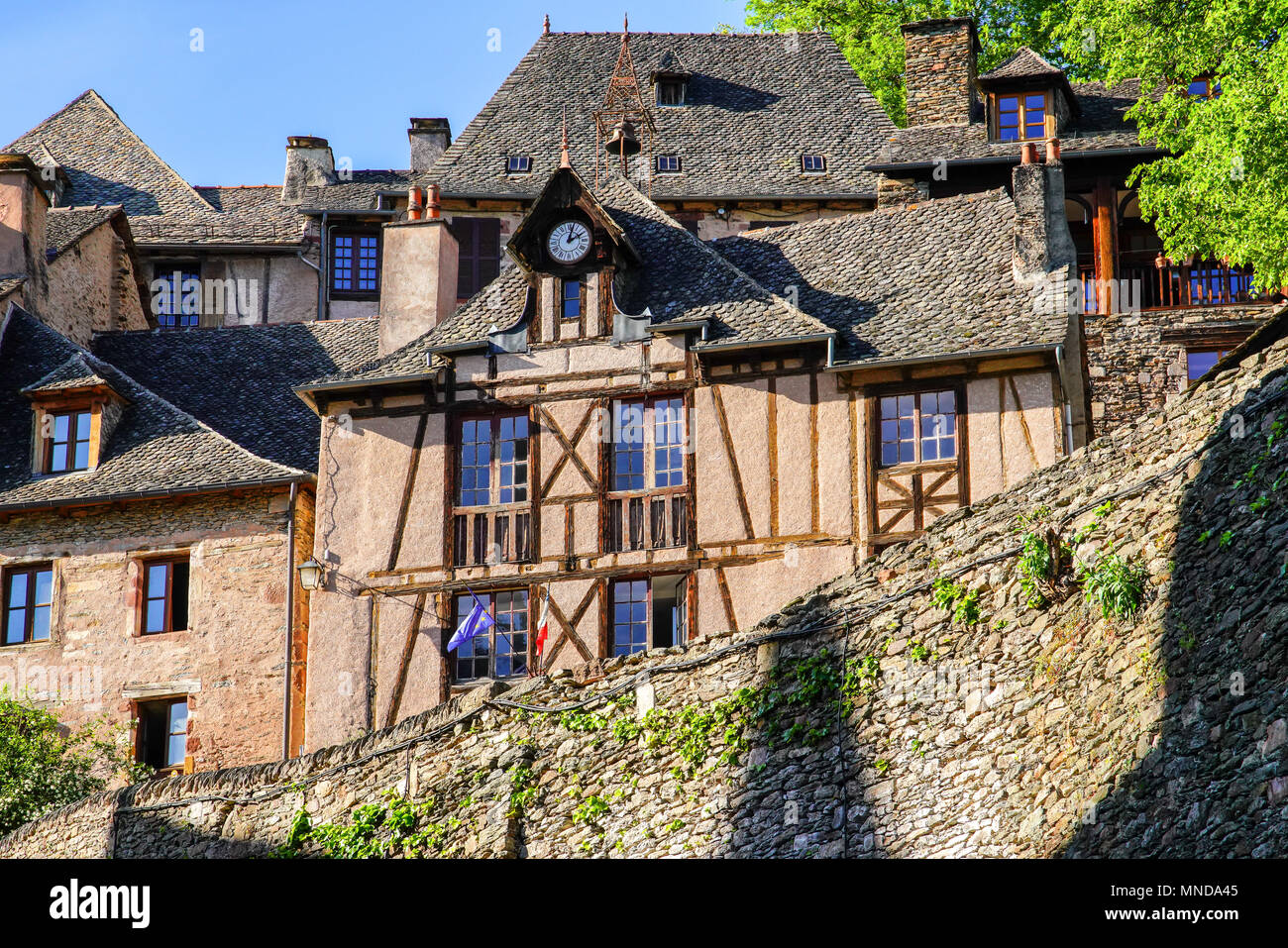 Streets in beautiful and picturesque medieval town Conques, Occitanie ...