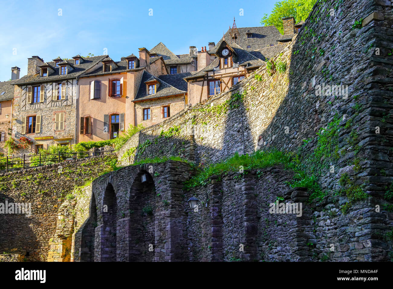 Medieval buildings of the pilgrims place conques hi-res stock ...