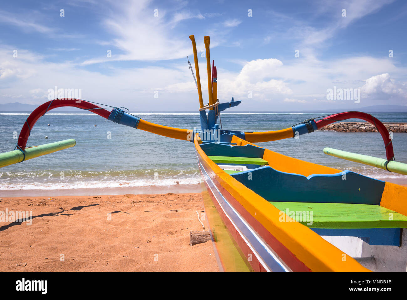 Colorful boat on a balinese beach in front of the sea, Sanur, Bali ...