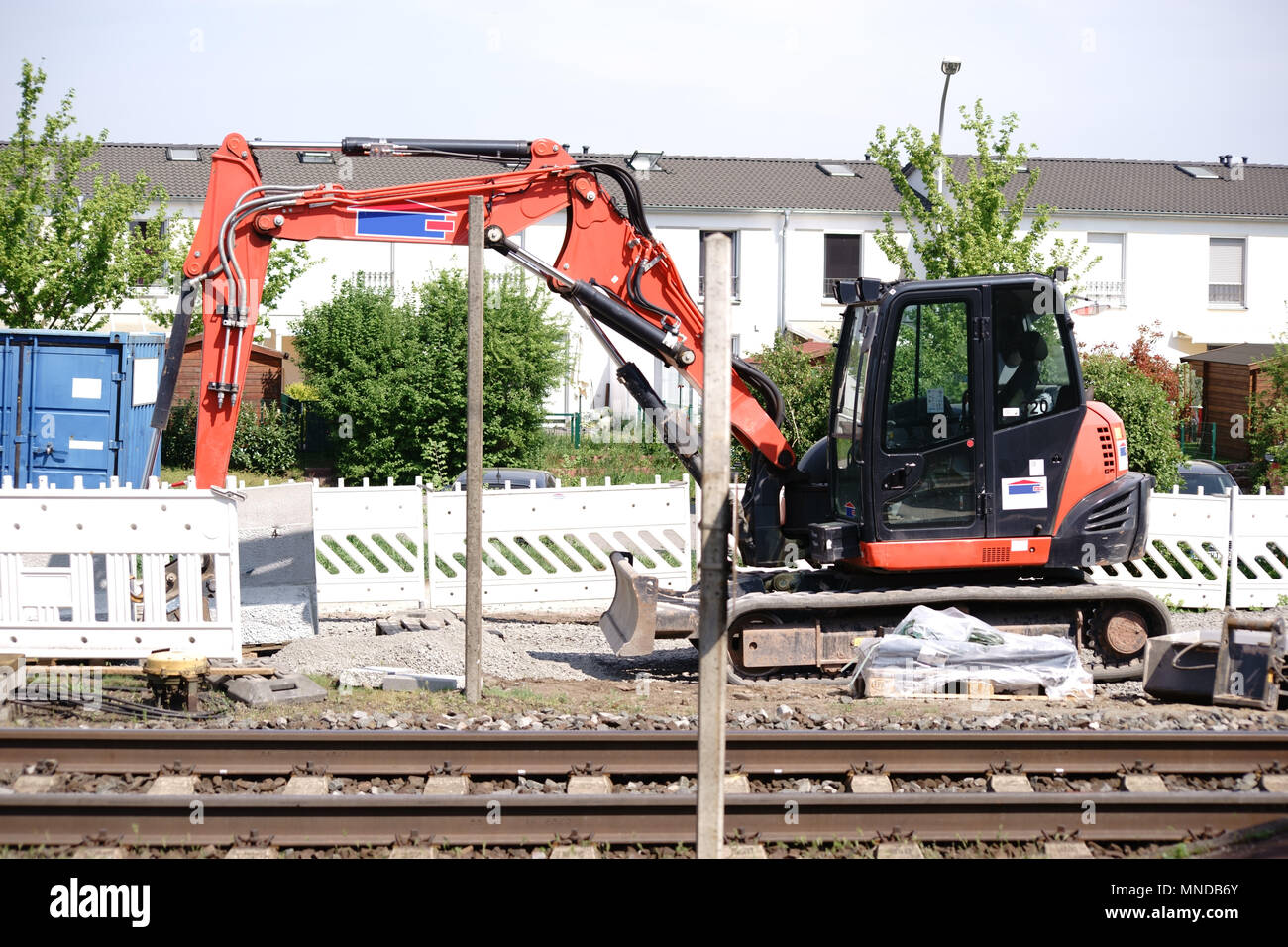 The side view of an excavator usable as a clearing vehicle on a ...