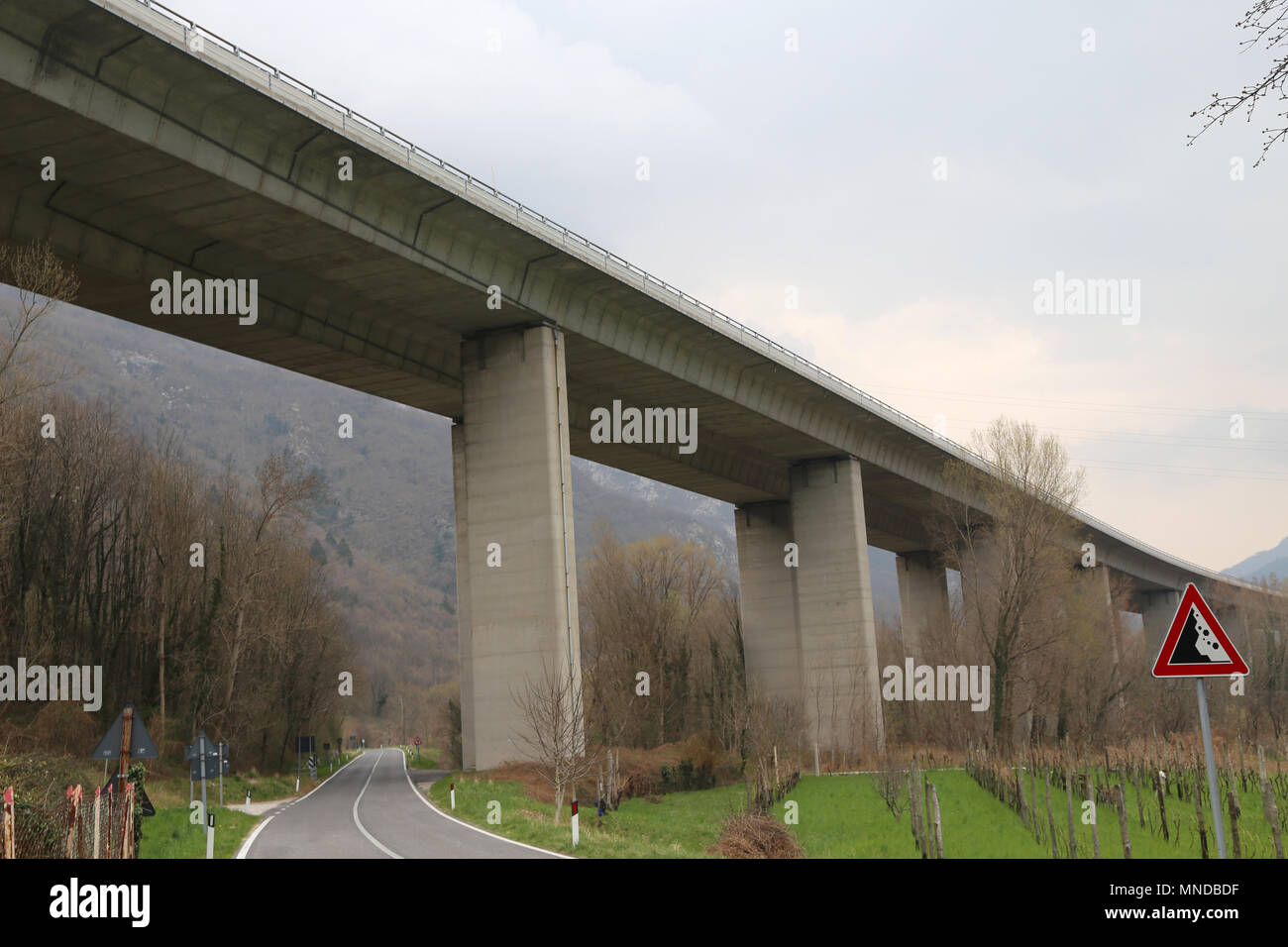 Concrete highway viaduct photographed from the bottom of the valley ...