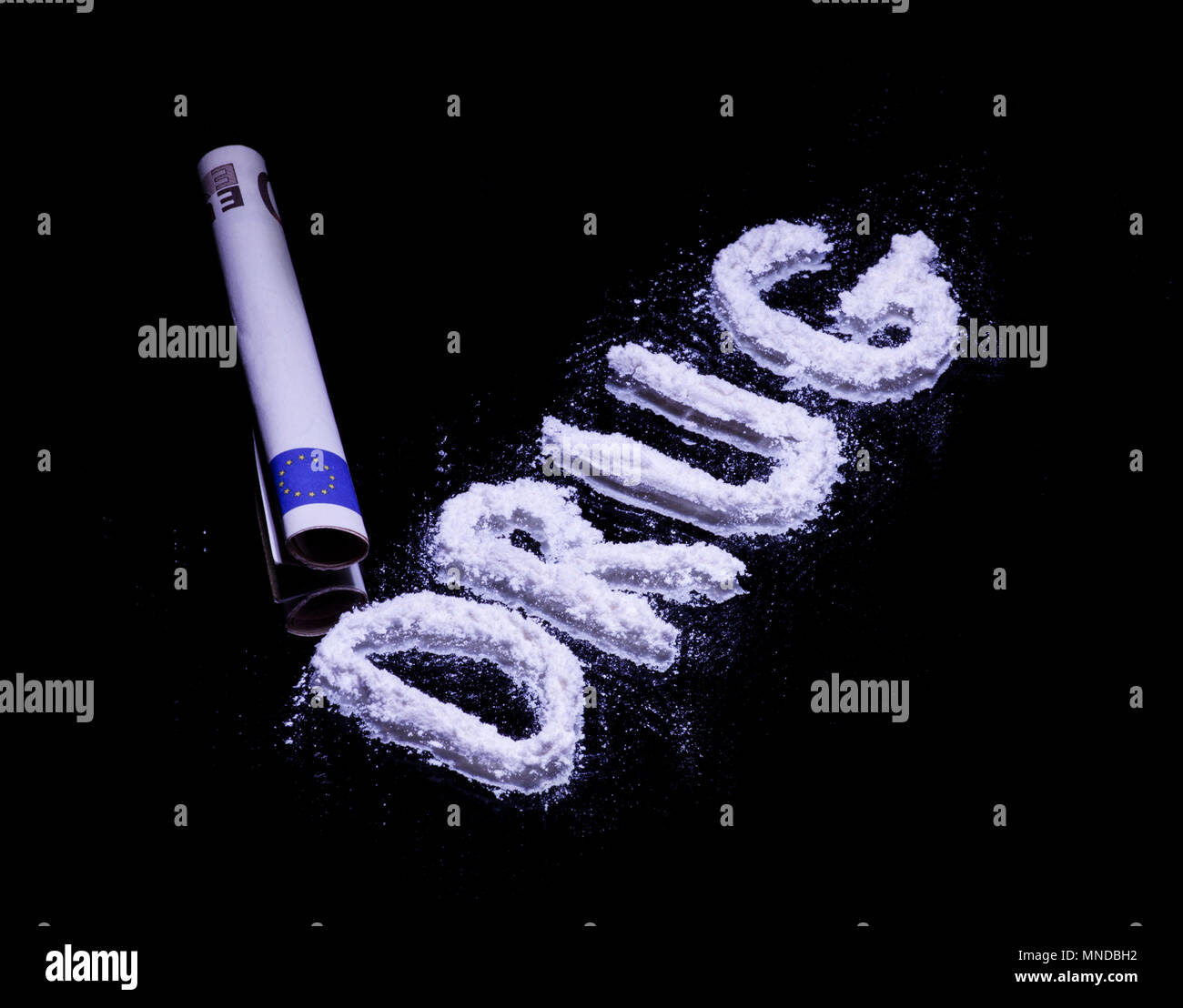 Word Drug on a mirror written with white powder and 50 euro note Stock ...