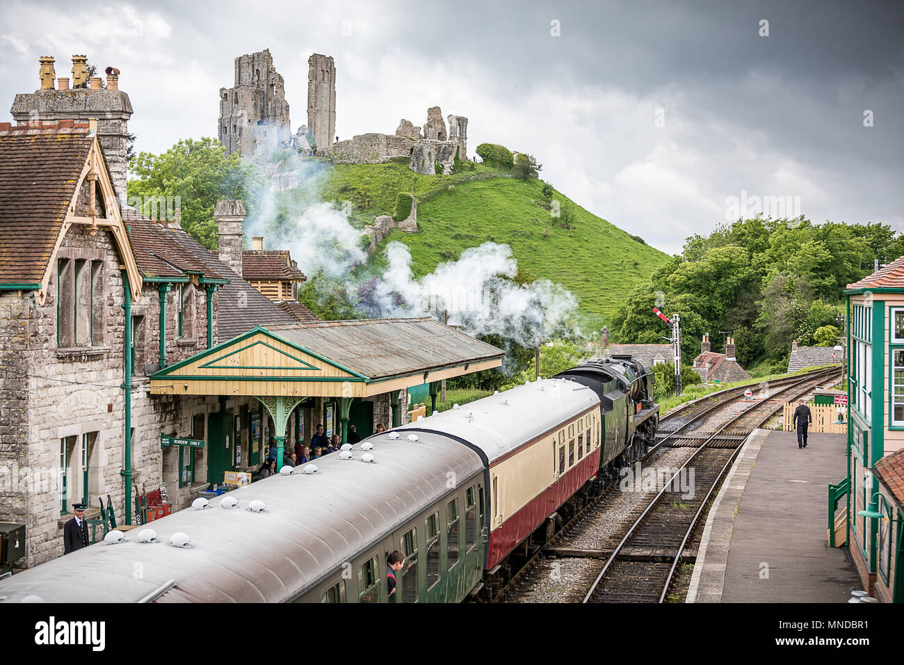 Steam locomotive Eddystone pulling out of Corfe Castle station taken in ...