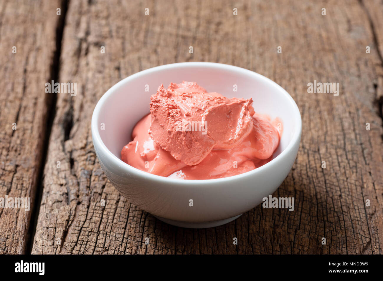Red lime paste or red limestone paste. Red lime paste is food-grade ...