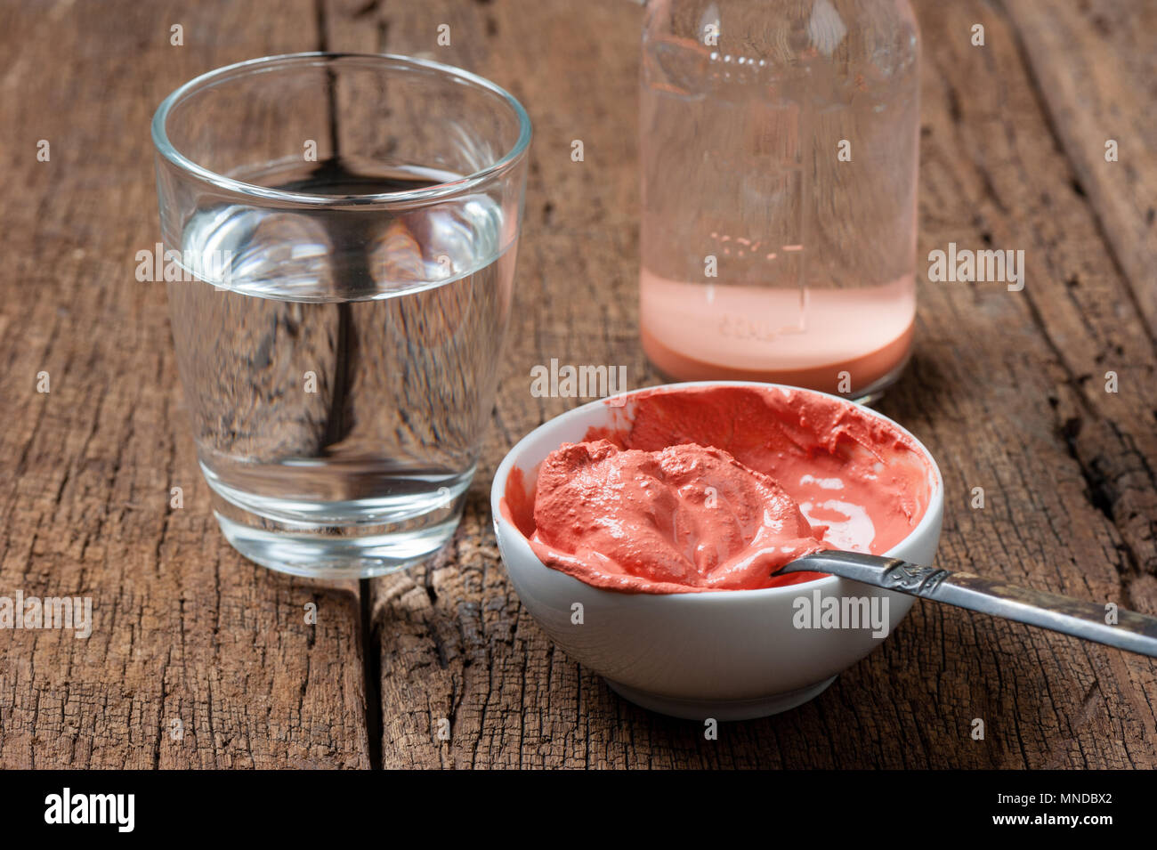 Red lime paste or red limestone paste. Red lime paste is food-grade ...