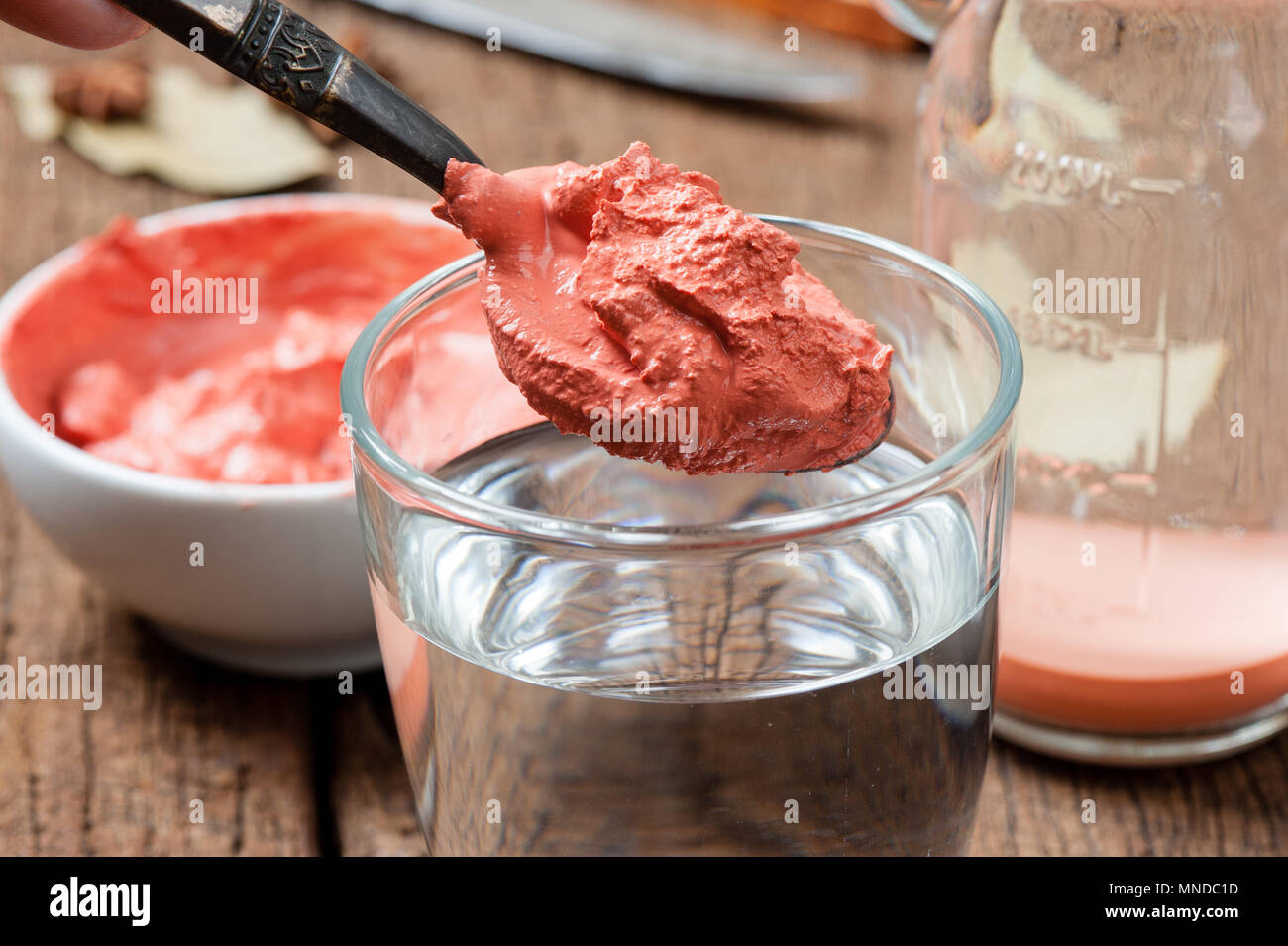 Red lime paste or red limestone paste. Red lime paste is food-grade ...