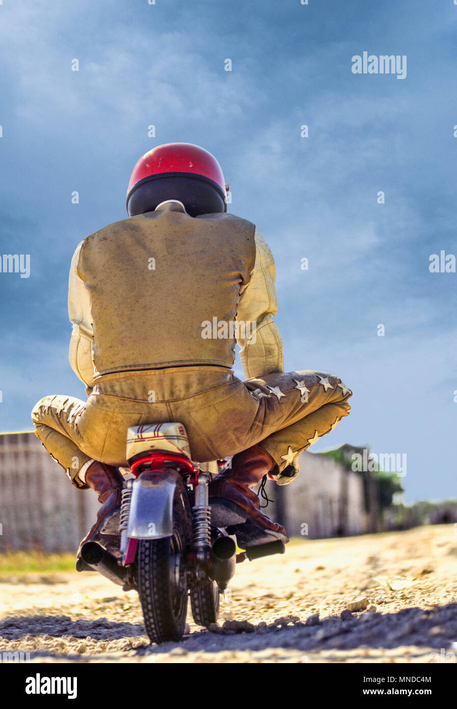 Biker riding motorcycle low angle hi-res stock photography and images ...