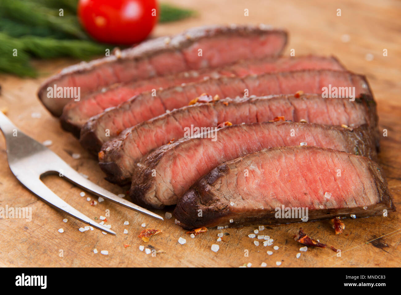 cooked beef steak medium well sliced Stock Photo - Alamy