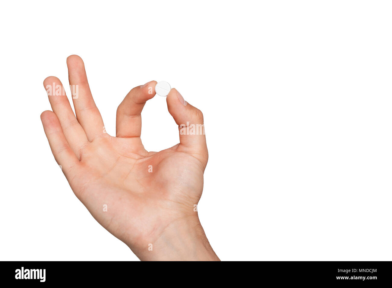 pill in man's hand on white background Stock Photo - Alamy