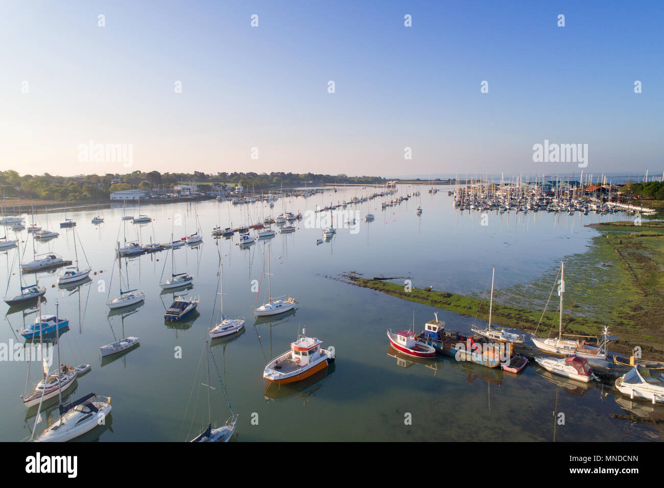 aerial views along the hamble river and hamble village taken by drone ...