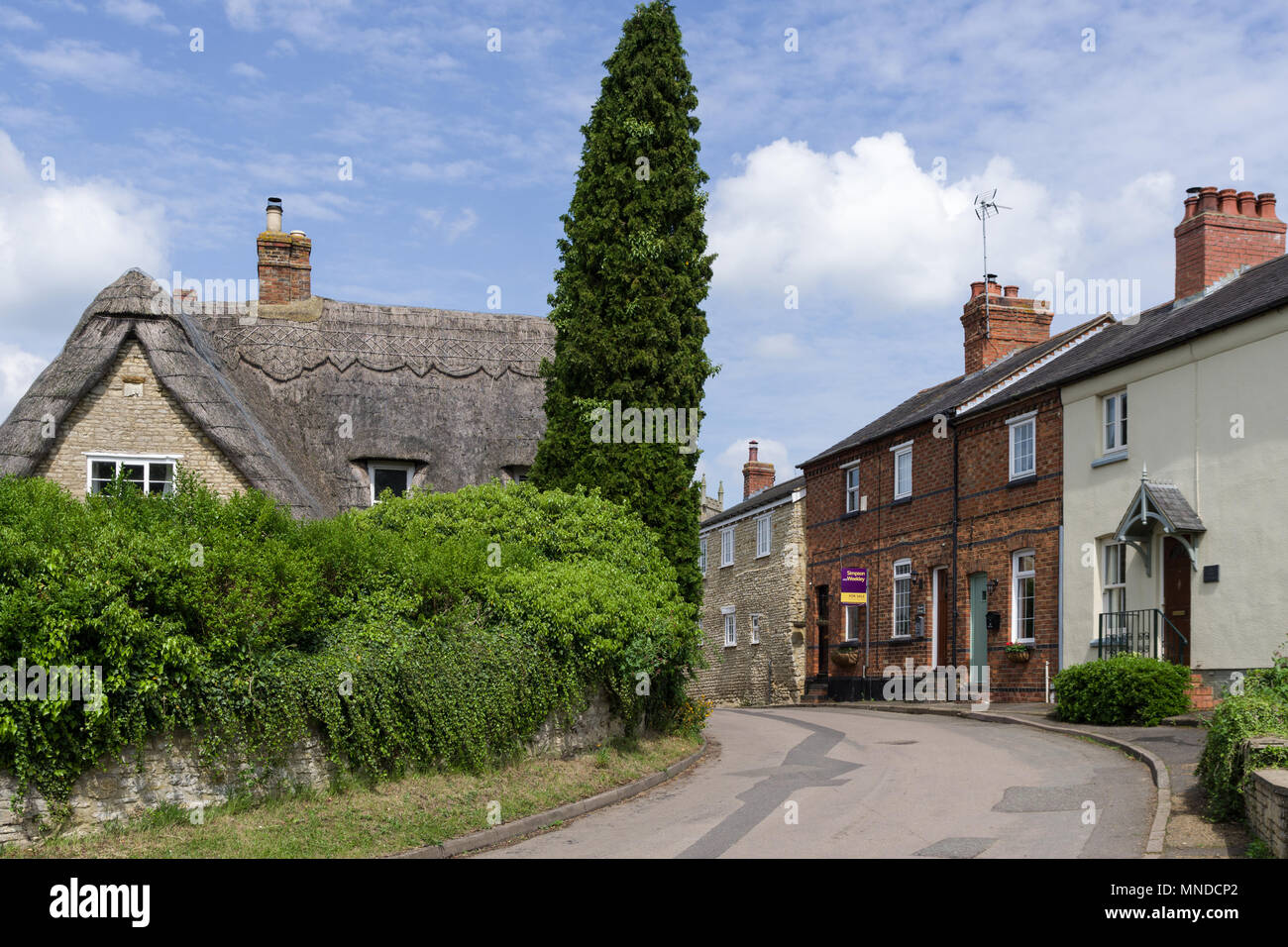 Street scene in the pretty village of Grendon, Northamptonshire ...