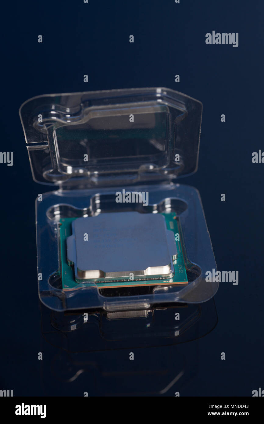 Central processing unit CPU processor microchip in the packaging box on ...