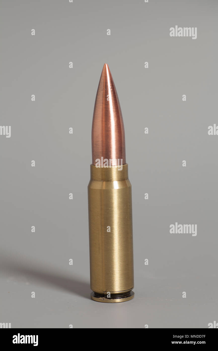 Bullet on a gray background Stock Photo - Alamy