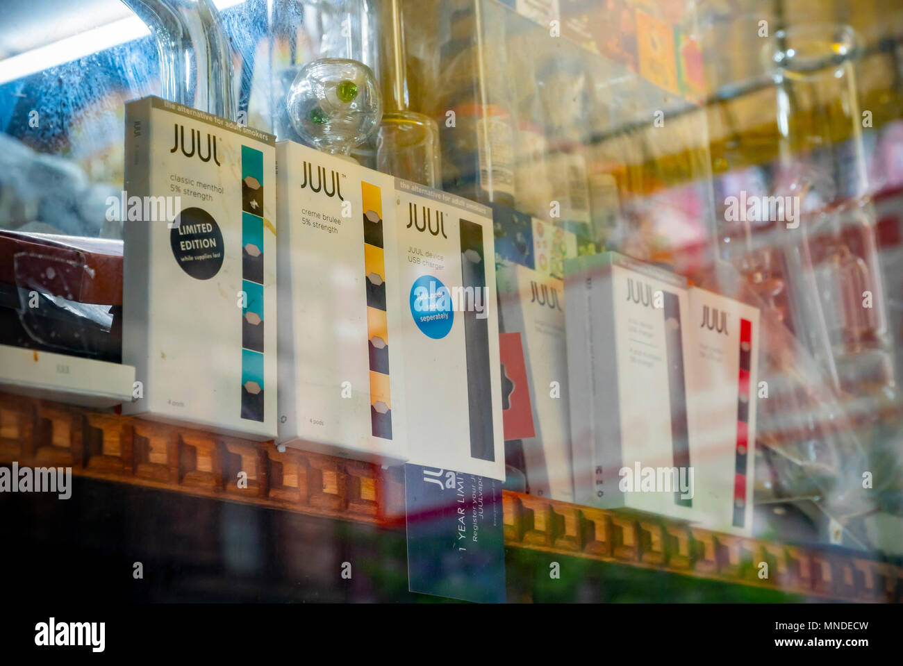A selection of the popular Juul brand vaping supplies on display in the ...