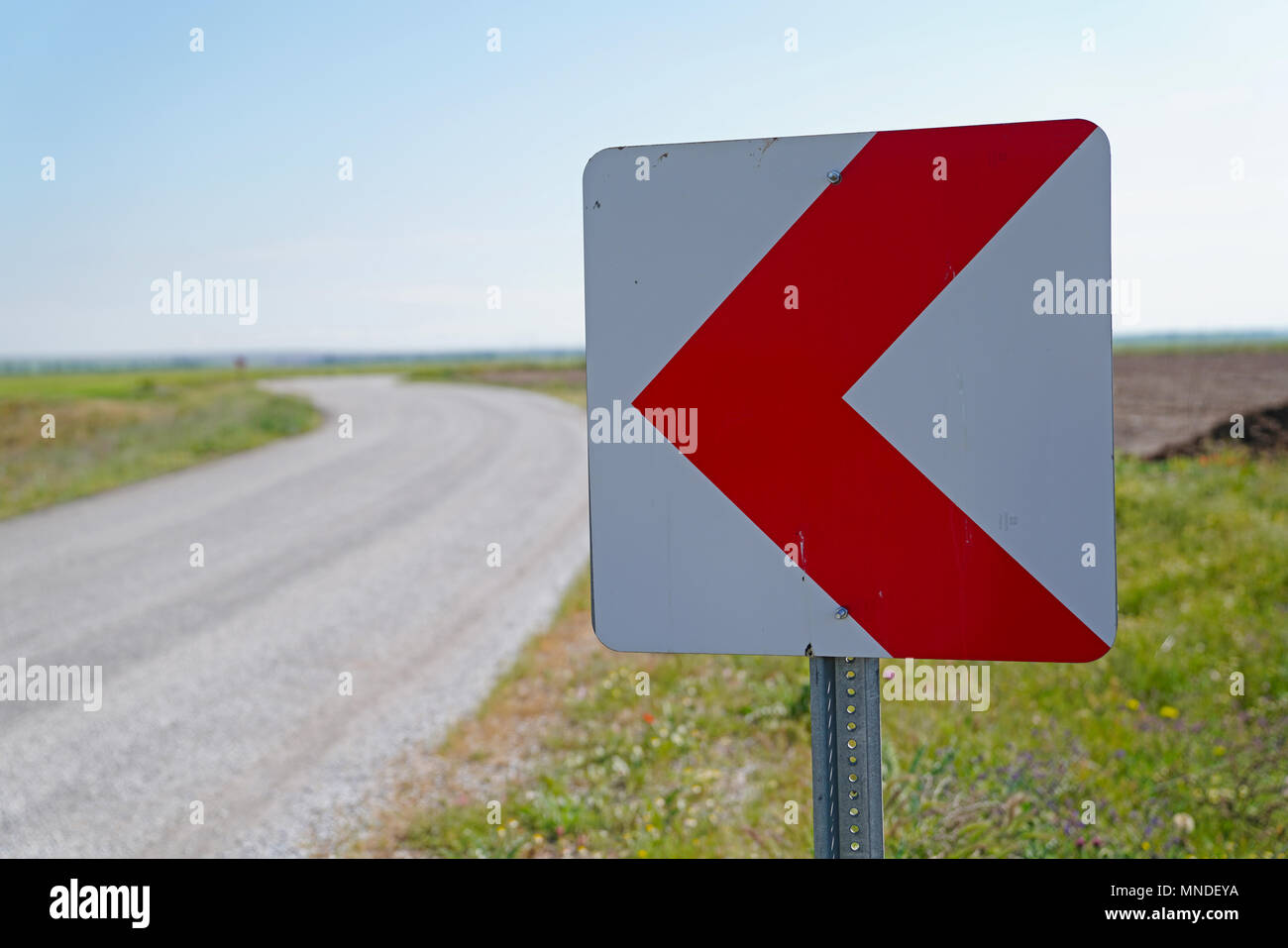 Road signs warning drivers about ahead dangerous curve Stock Photo - Alamy
