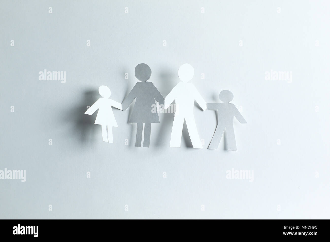 happy paper family on a paper background Stock Photo - Alamy