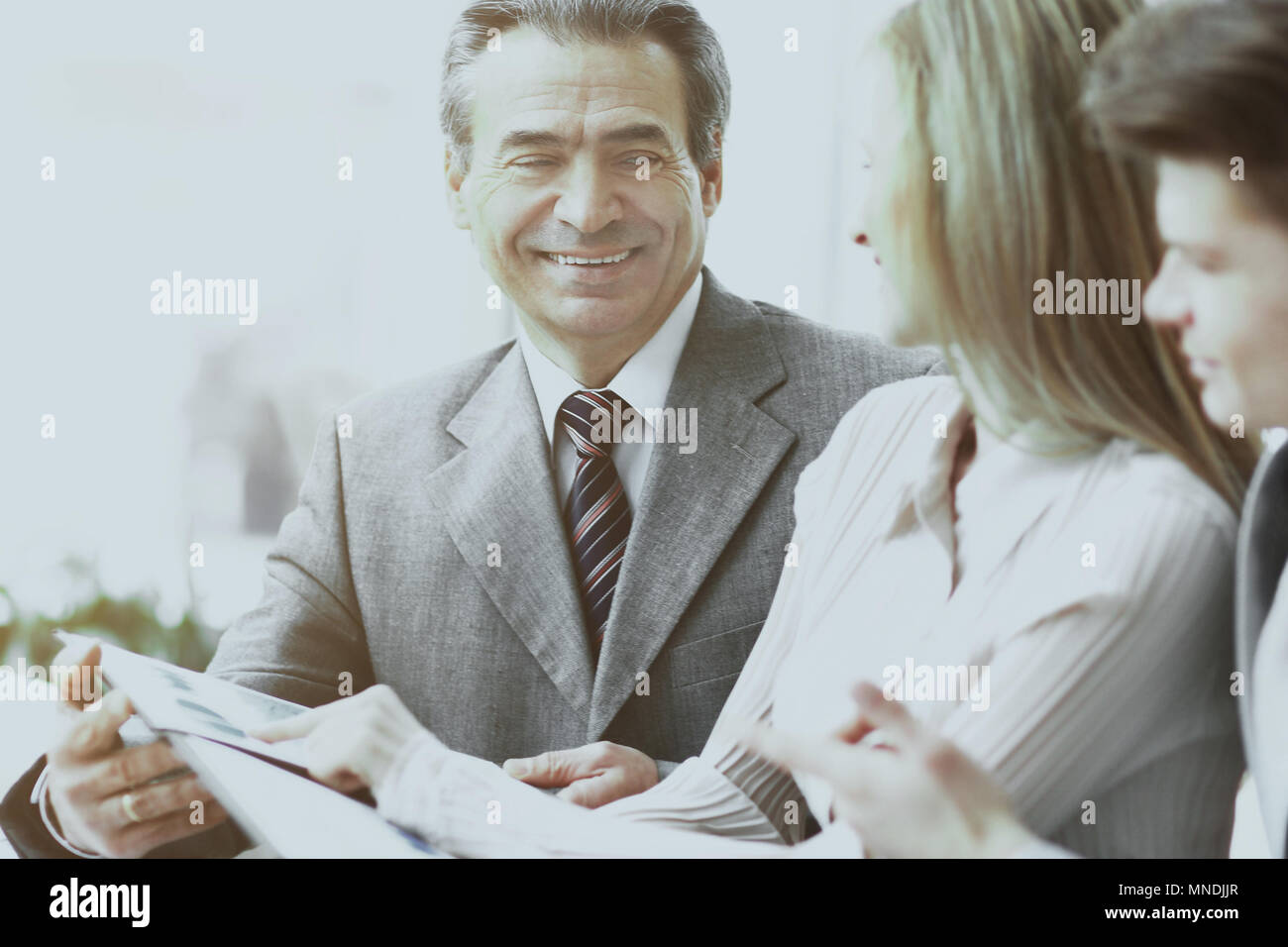Business team working on their business project together Stock Photo ...