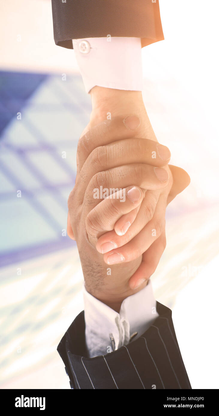 The conclusion of the transaction. Handshake Stock Photo - Alamy