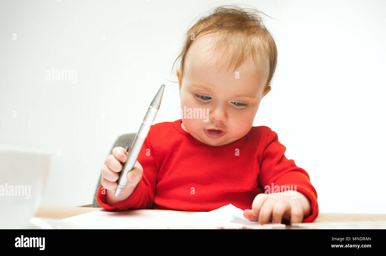 Happy child baby girl toddler sitting with keyboard of computer ...