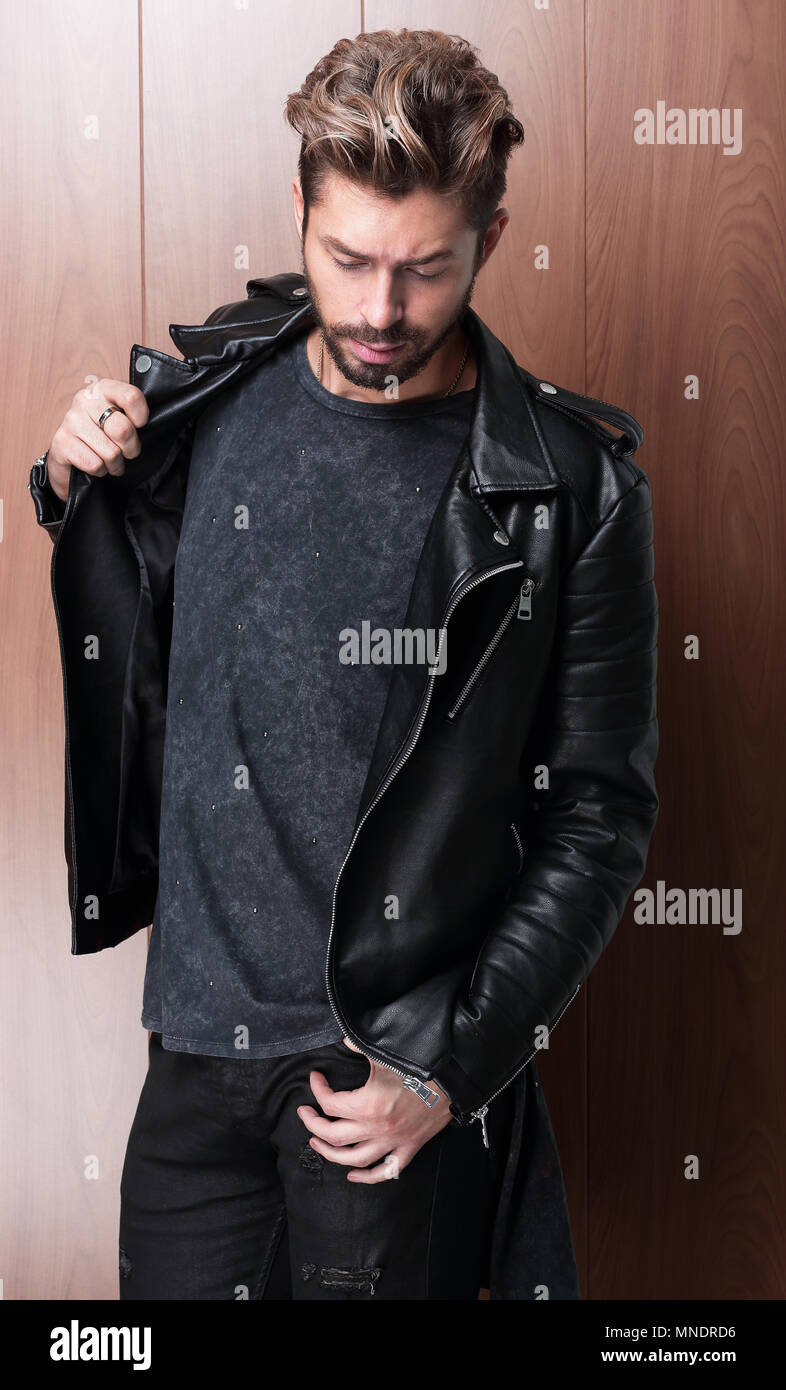Muscular man in leather jacket hi-res stock photography and images - Alamy