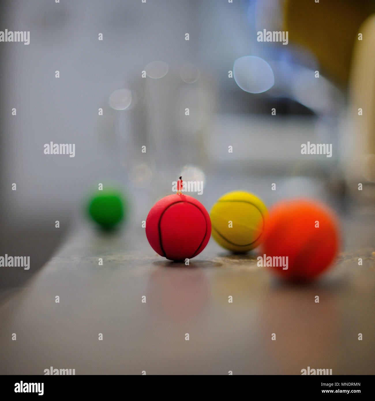 woman figure standing on top of ball Stock Photo - Alamy
