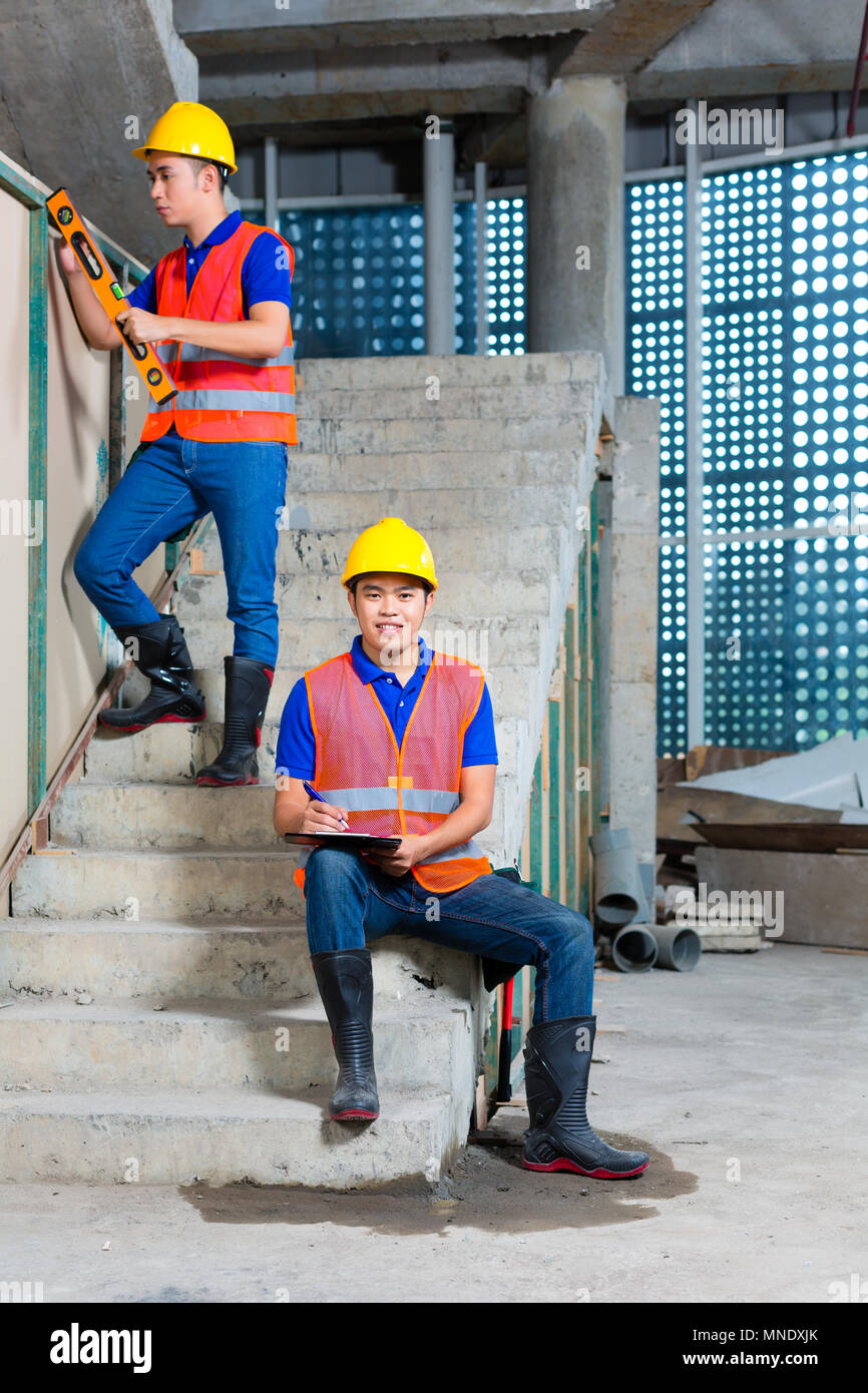 Indonesian construction workers building construction hi-res stock ...