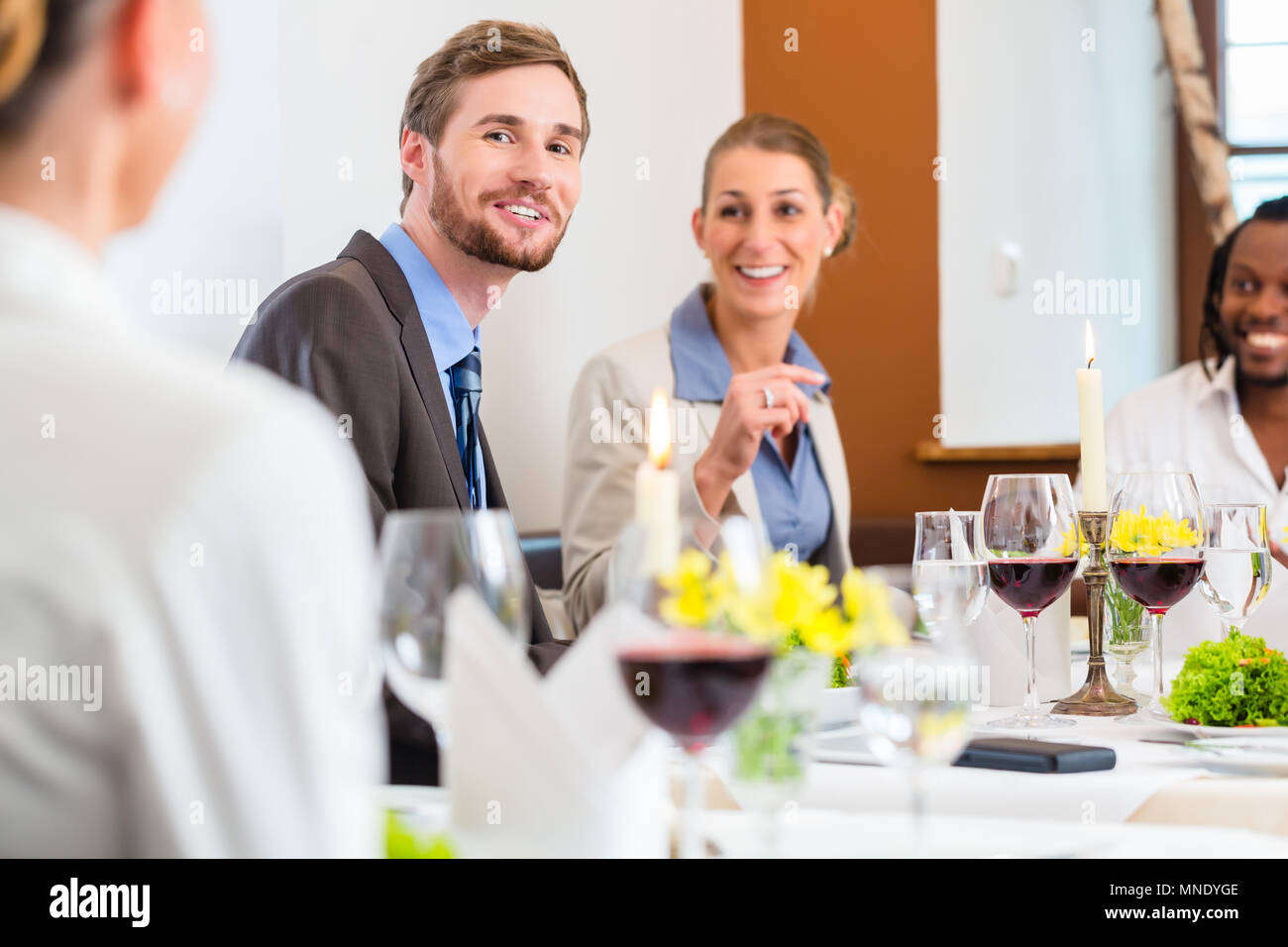 Team at business lunch in restaurant Stock Photo - Alamy